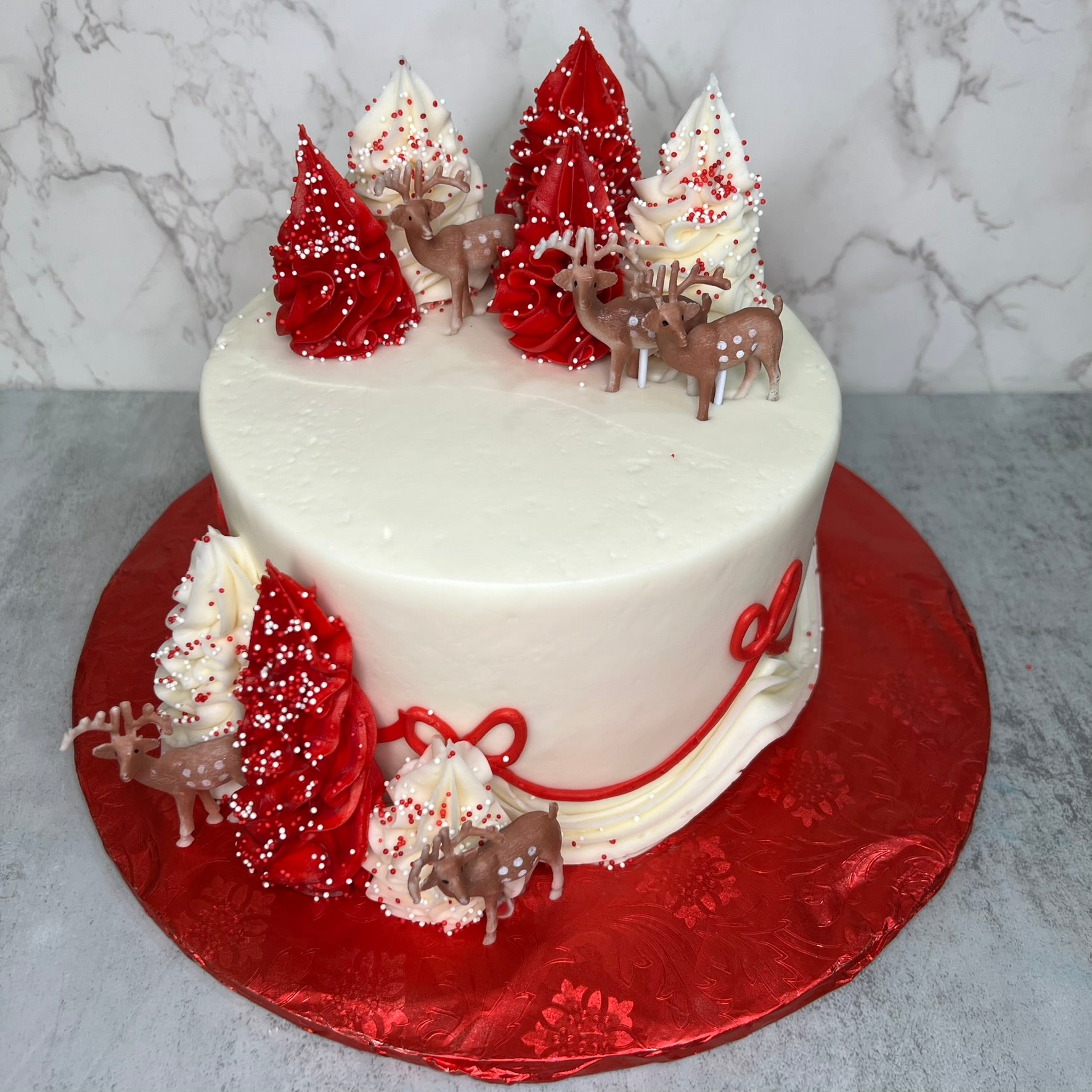 Red and White Trees and Deer – Clay's Bakery