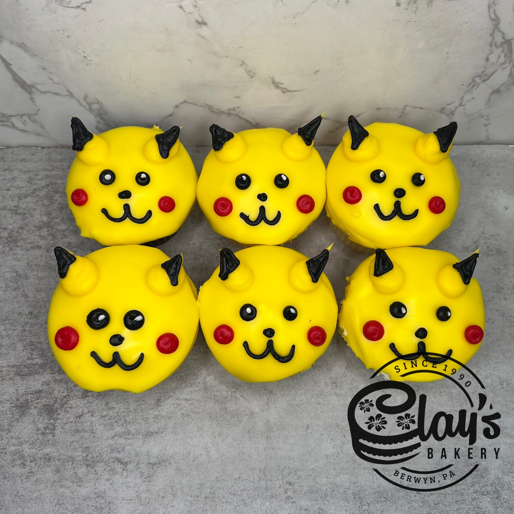 Yellow Dipped Pikachu Cupcakes – Clay's Bakery