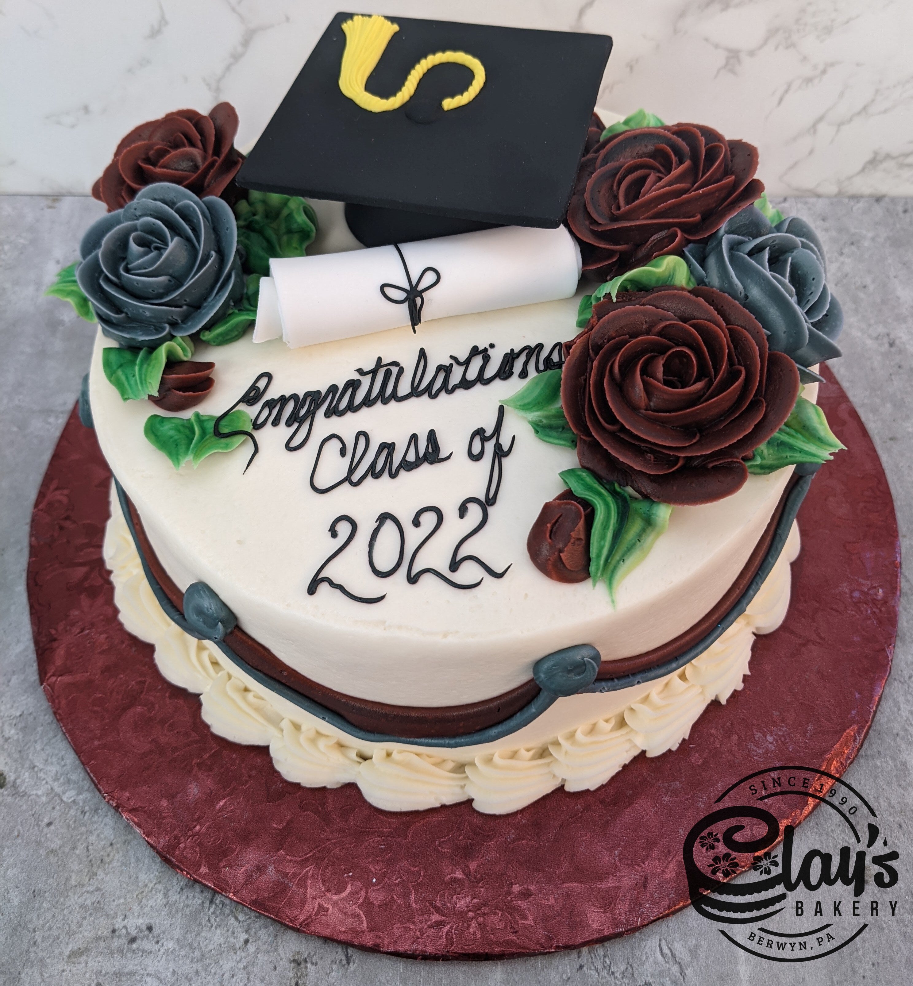 Graduation Flowers with Graduation Cap – Clay's Bakery