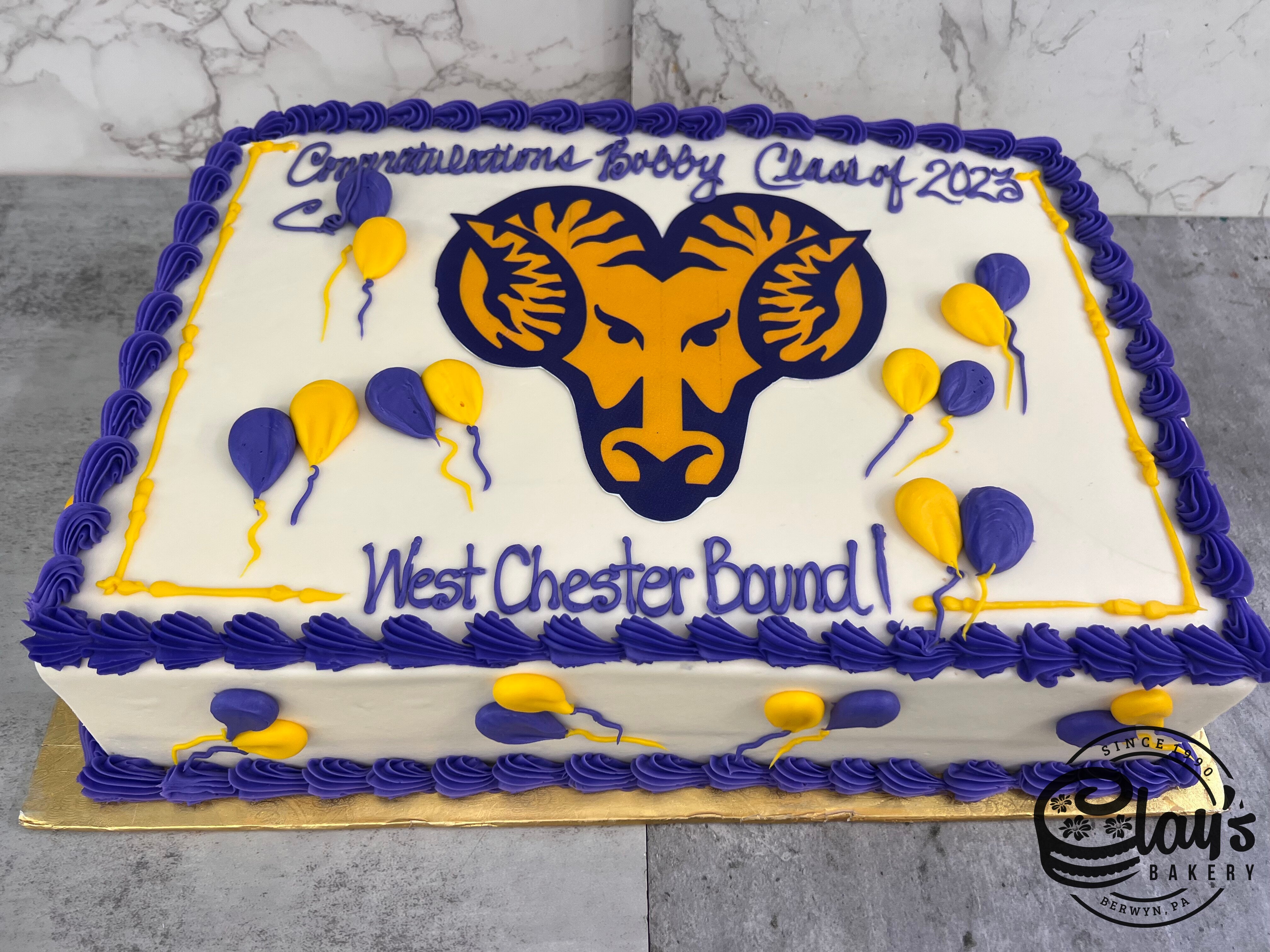 School Logo with Clusters of Balloons – Clay's Bakery